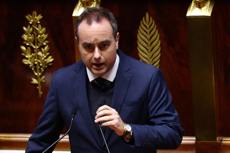 French PM forces part of budget bill through lower house without vote