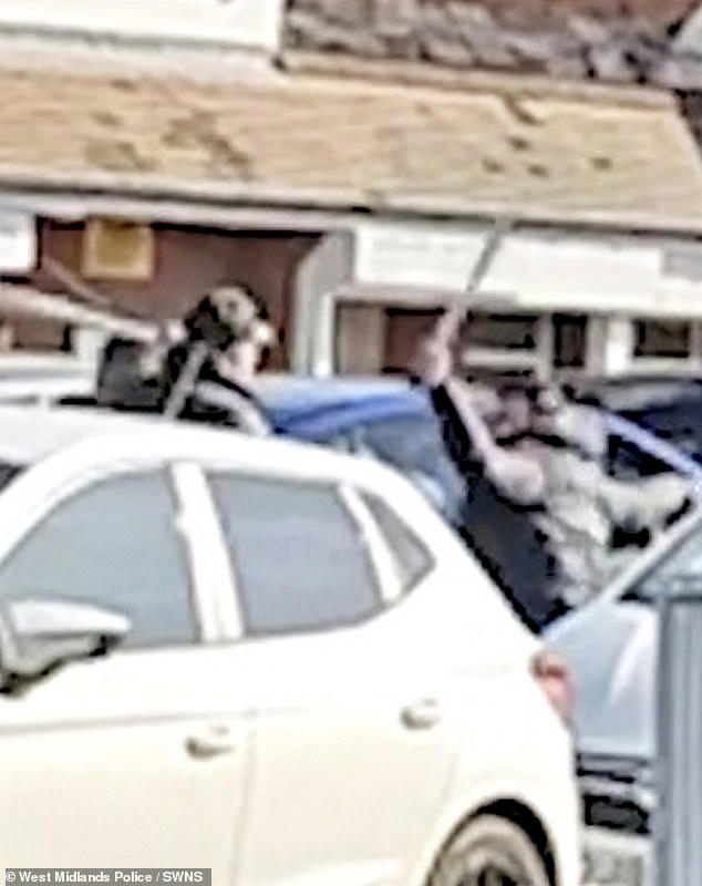 Moment thugs wield machetes and fire a gun during vicious street brawl ...
