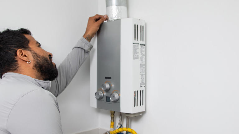 Creative DIYer turns tankless water heater cover eyesore into a ...