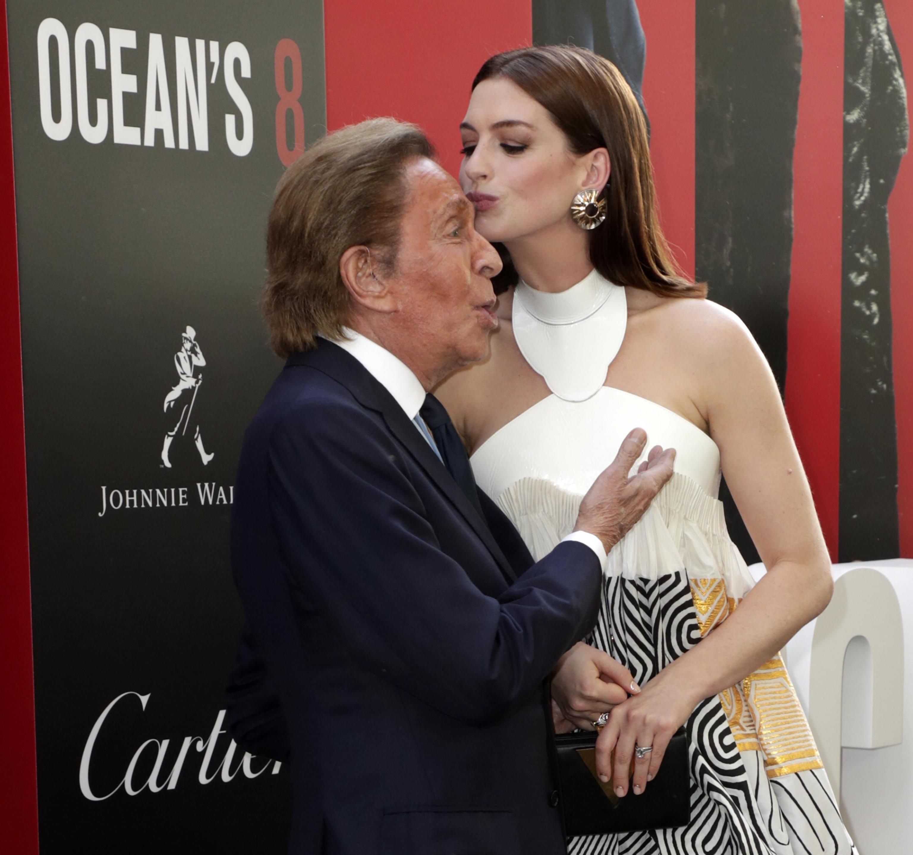 Valentino a titan, made my world brighter, says Anne Hathaway
