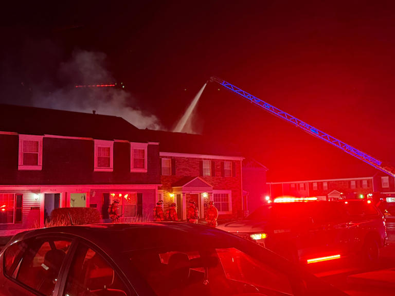 Dozens displaced after suspected kitchen fire spreads through apartment ...