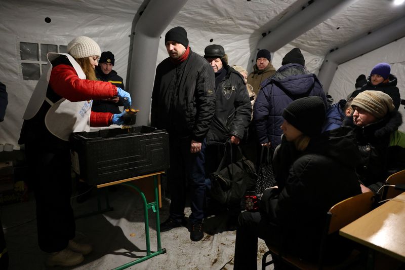 Russian attack plunges Kyiv into cold, threatens nuclear-linked facilities