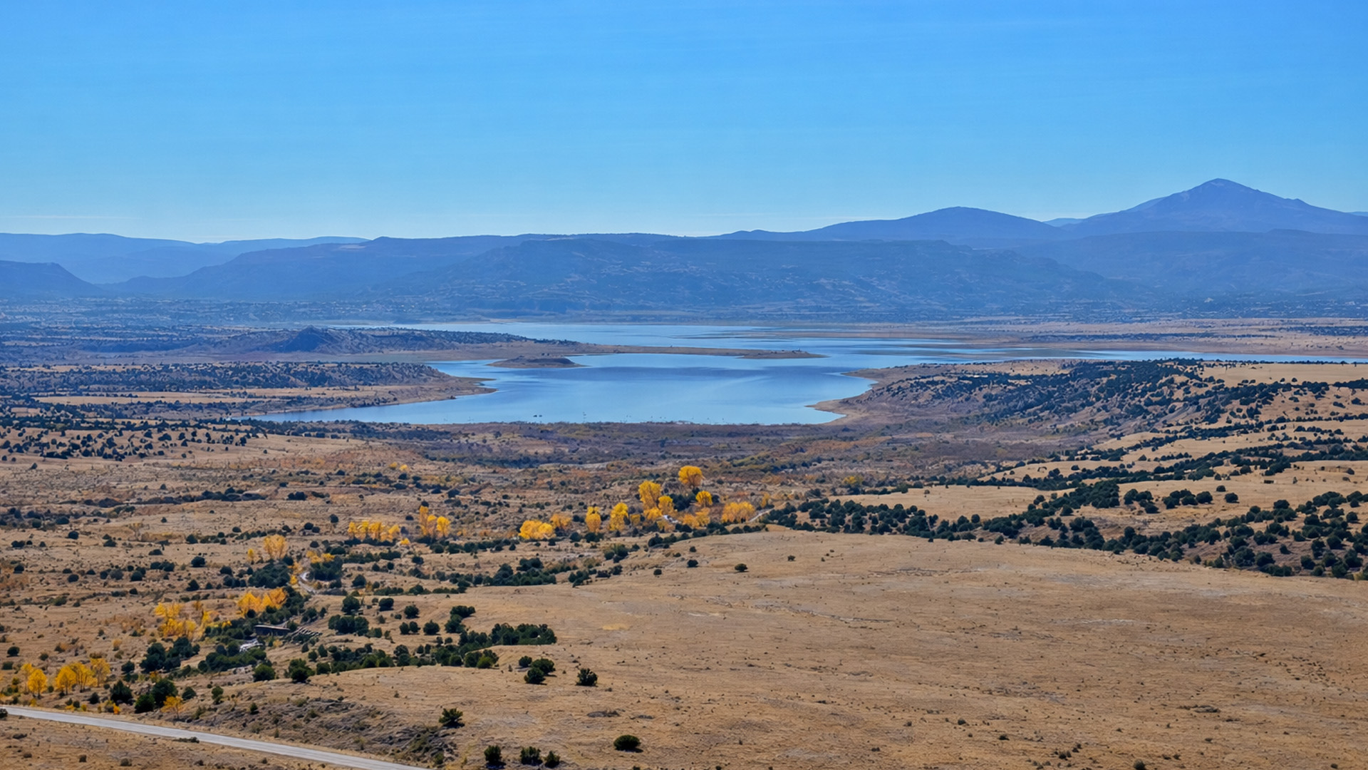 What lies beyond these distant hills?