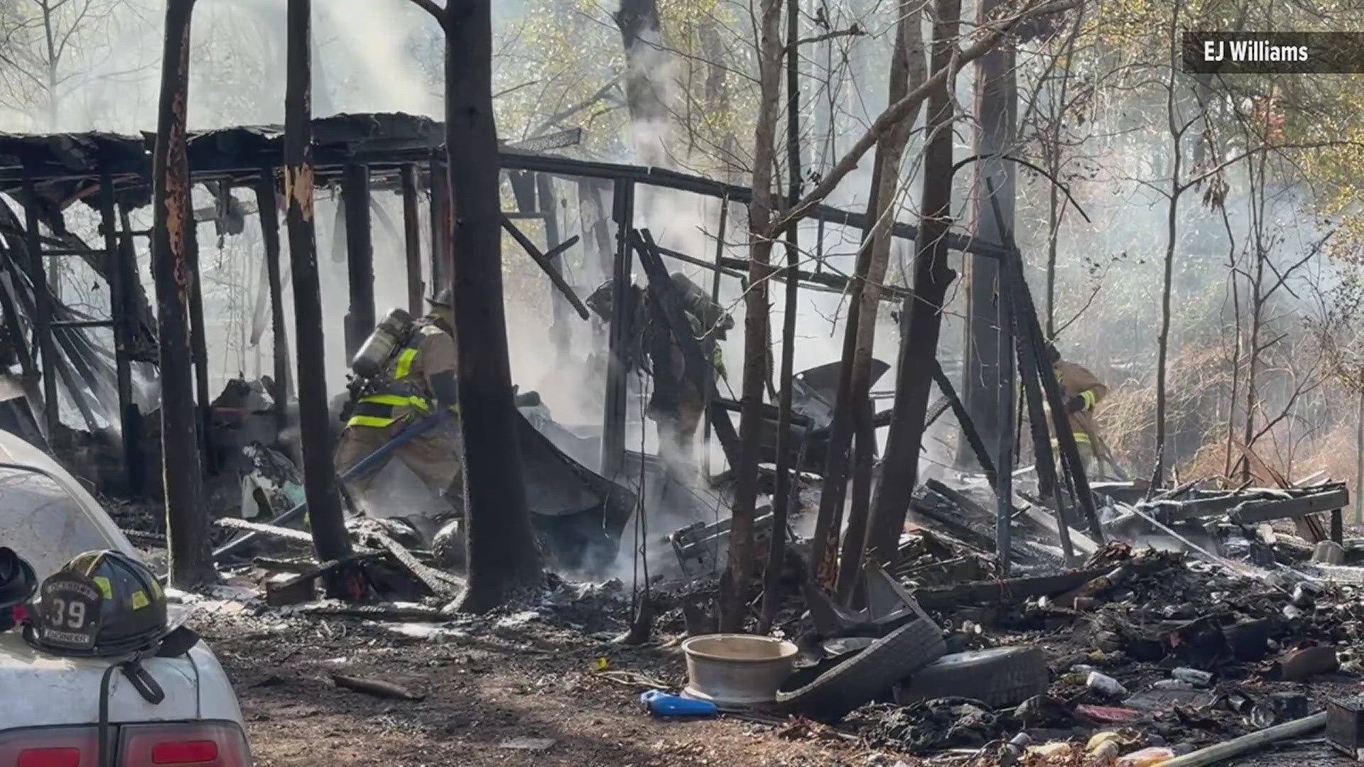Outdoor burn sparks fire that destroys Orange County mobile home