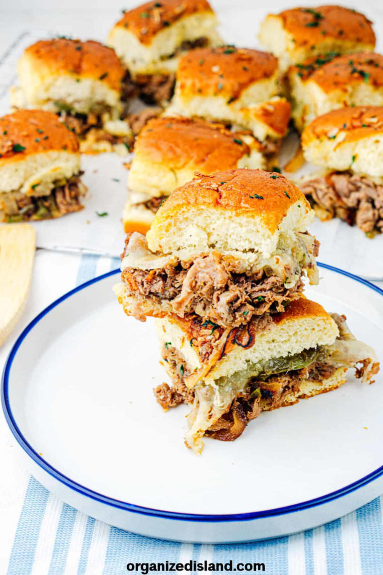 Philly cheesesteak sliders on Hawaiian rolls