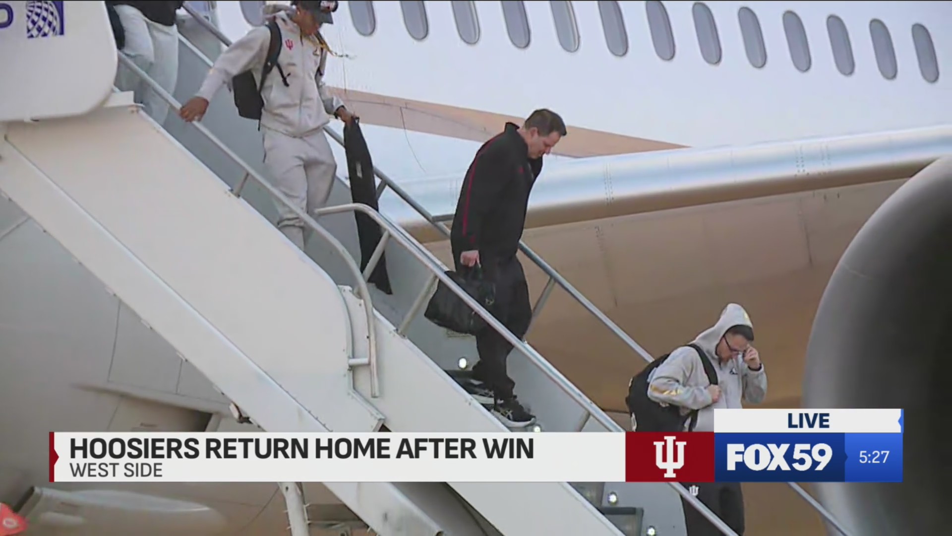 Coach Cignetti, Hoosiers get off plane in Indianapolis