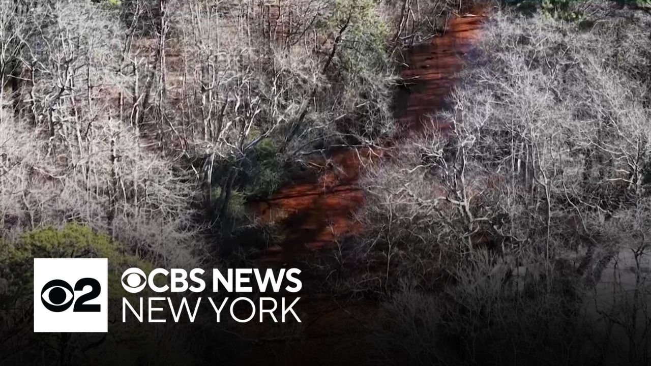 Long Island residents not giving up on orange creek cleanup