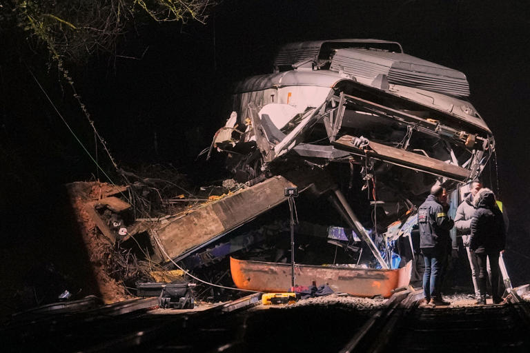 Commuter train in Spain hits collapsed wall, killing at least 1 person