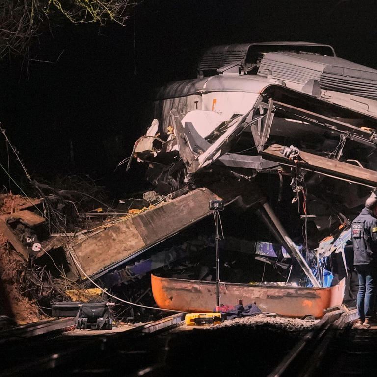 Commuter train in Spain hits collapsed wall, killing at least 1 person