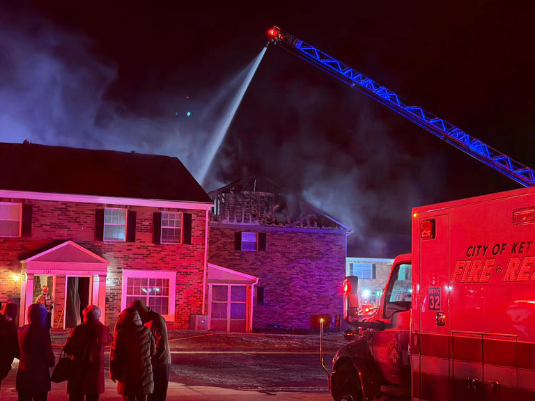 Dozens displaced after suspected kitchen fire spreads through apartment ...