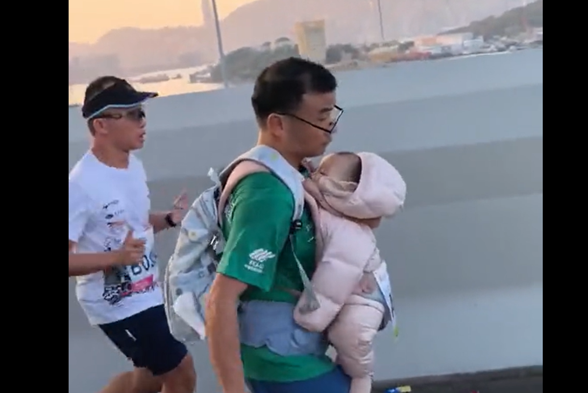 Man disqualified from Hong Kong marathon for running with baby