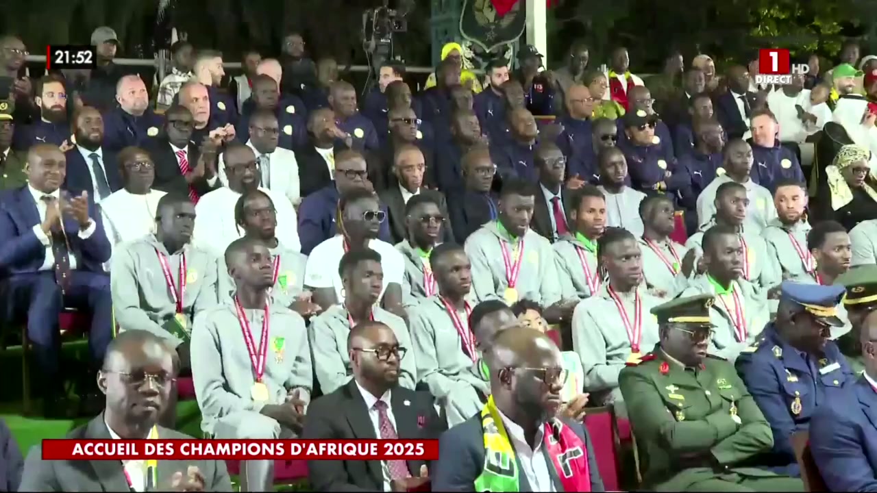 Senegal’s AFCON champions present trophy to President Faye after mass ...