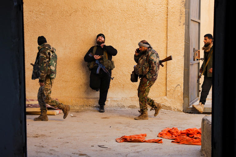 Orange uniforms, empty cells and bullets: Inside Syria’s Shaddadi ...