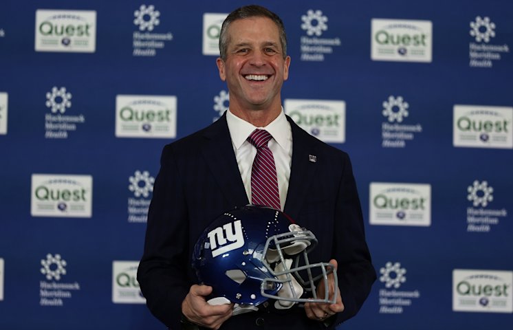 New coach John Harbaugh embraces the challenge of turning the Giants ...