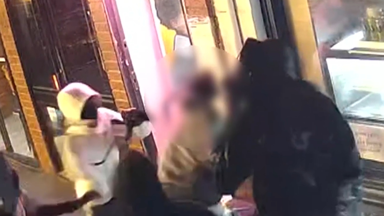 Four arrested over New Year's Eve machete attack