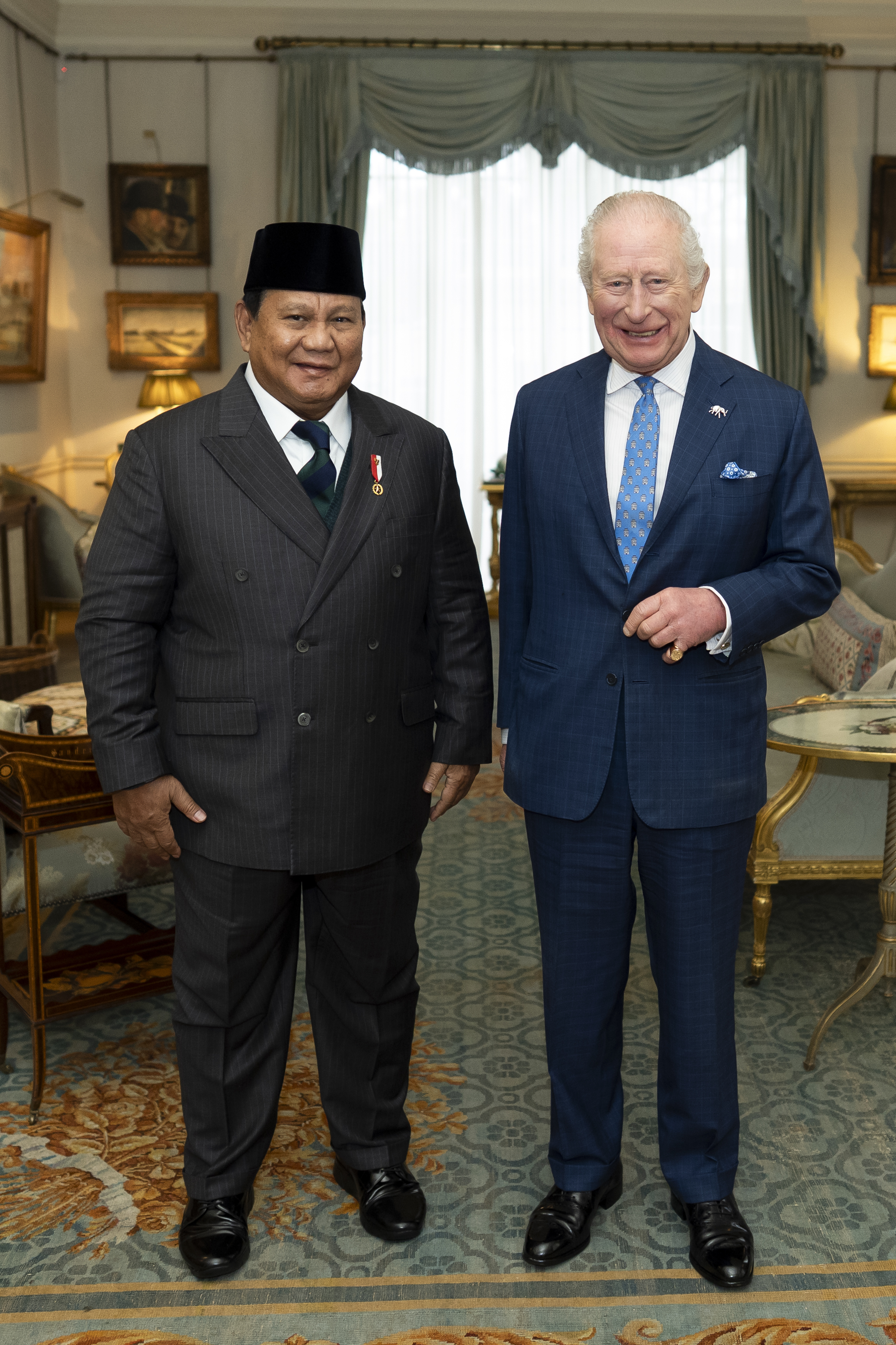 King back in London carrying out duties as Harry prepares to enter ...