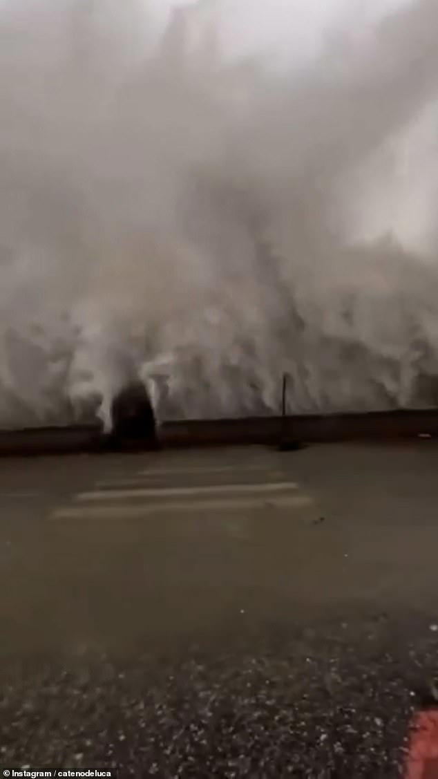People run for their lives from tsunami-style storm surge which engulfs ...