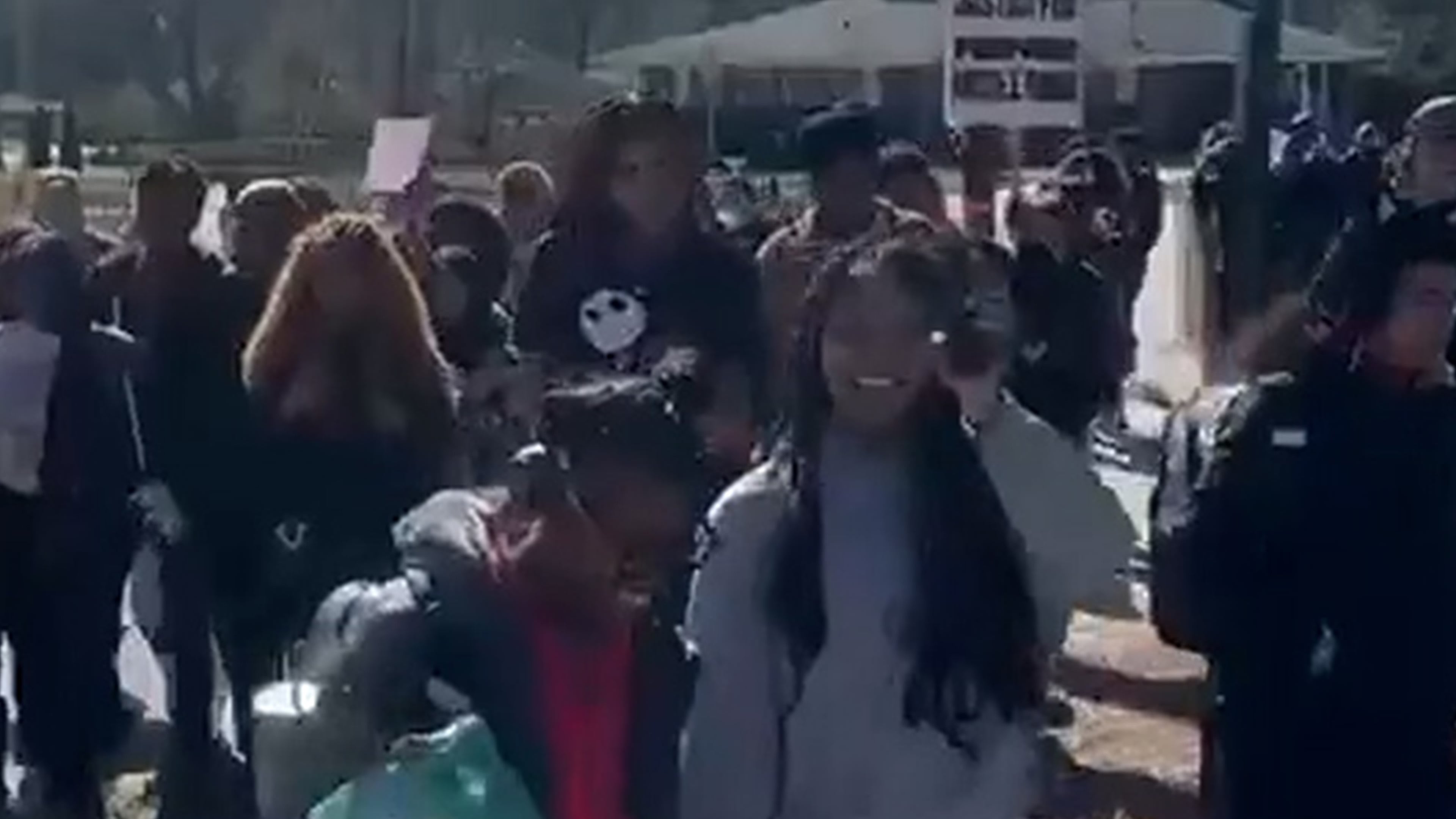 High school students walk out of class to protest ICE and Trump on ...