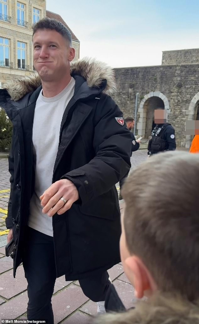 Gladiators star Legend is stopped for a snap by police officers while ...