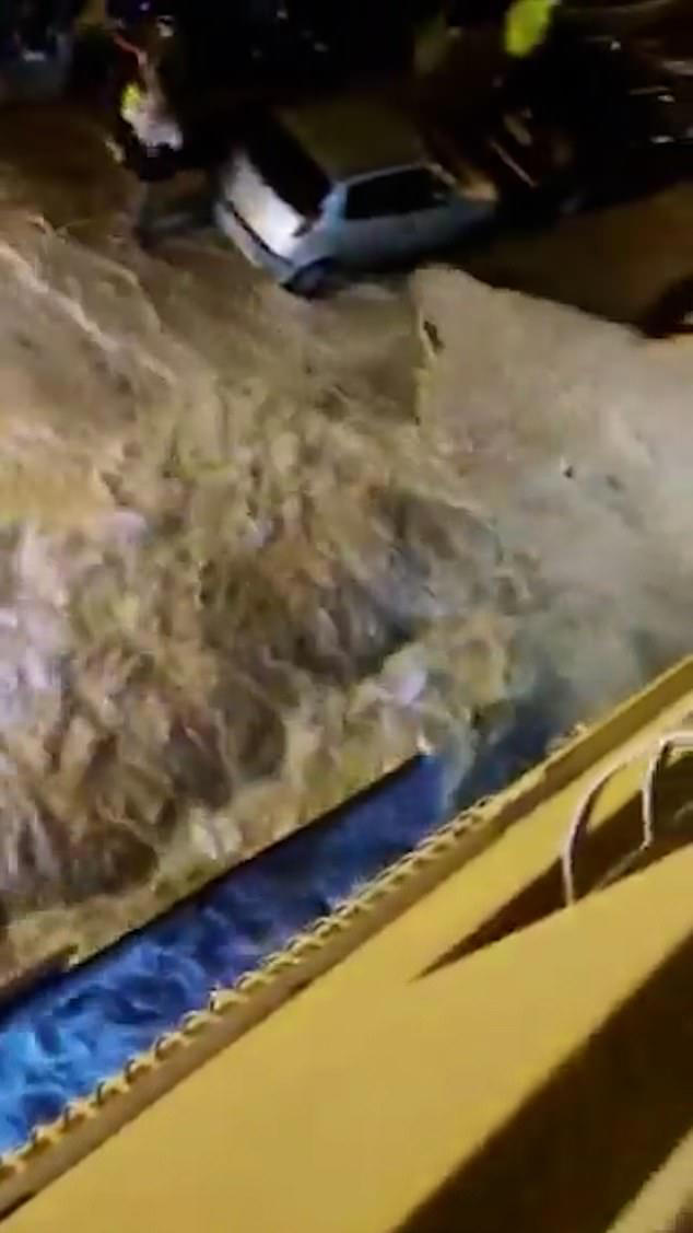 People run for their lives from tsunami-style storm surge which engulfs ...