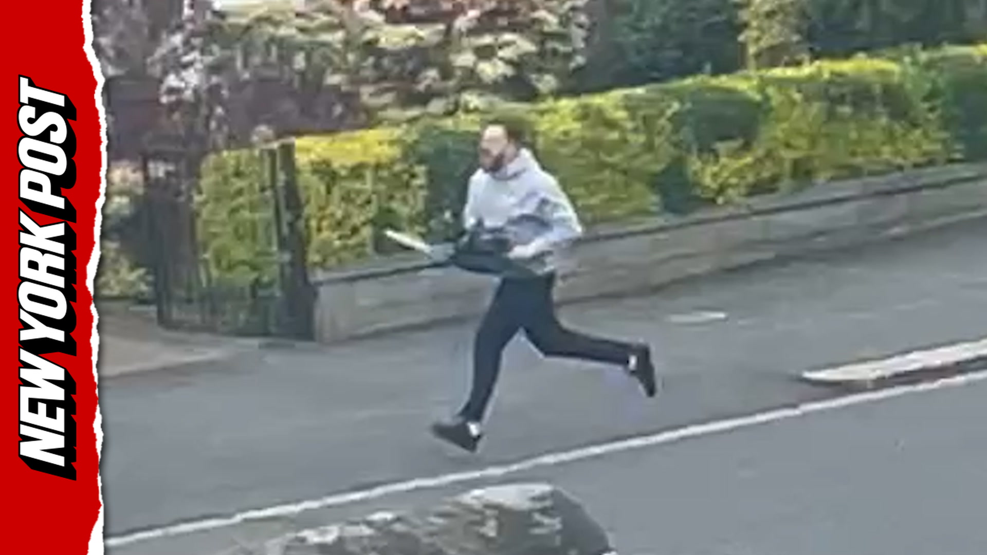 Wild video shows maniac chasing cop with chainsaw