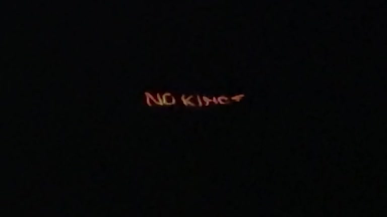 'No Kings' sign lit over Davos ahead of Trump visit