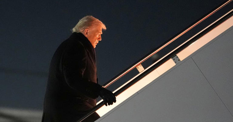 The latest: Trump's plane delayed on the way to Davos economic forum