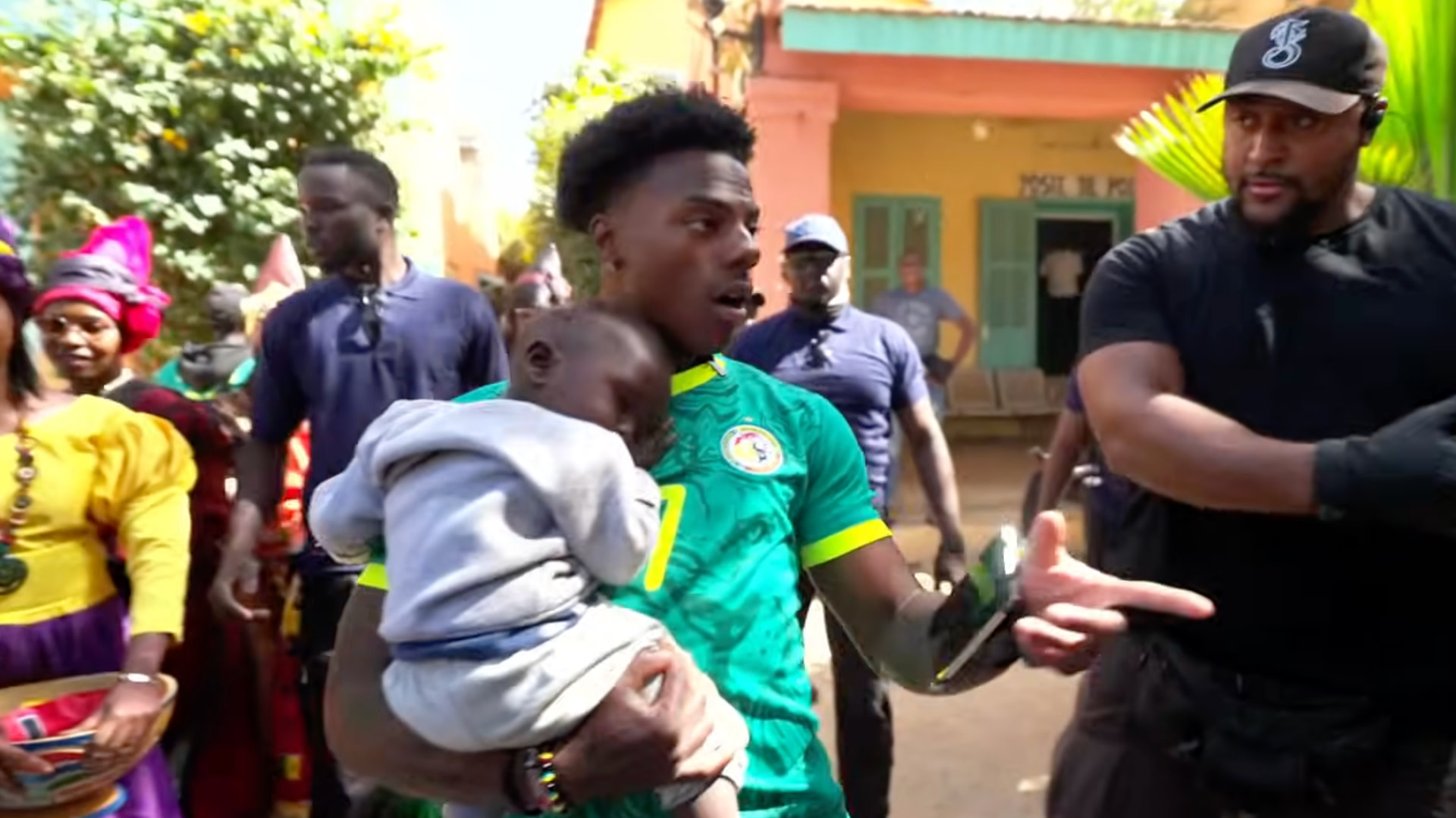 IShowSpeed gets handed baby during Senegal stream: 'Whose baby is that?'