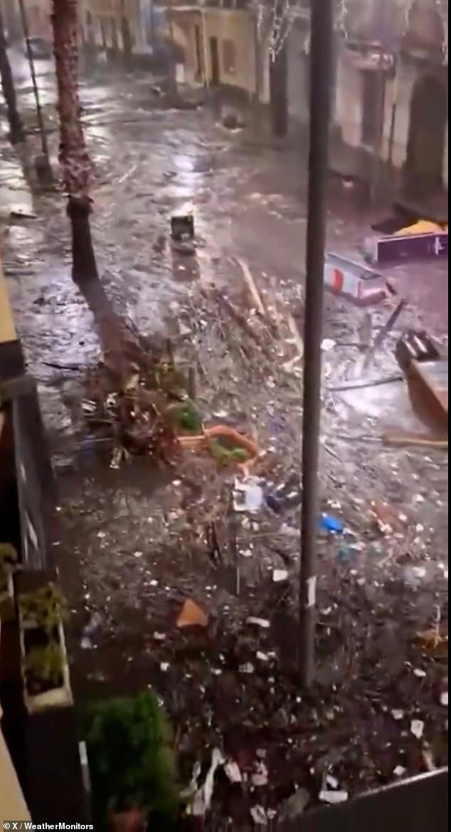People run for their lives from tsunami-style storm surge which engulfs ...