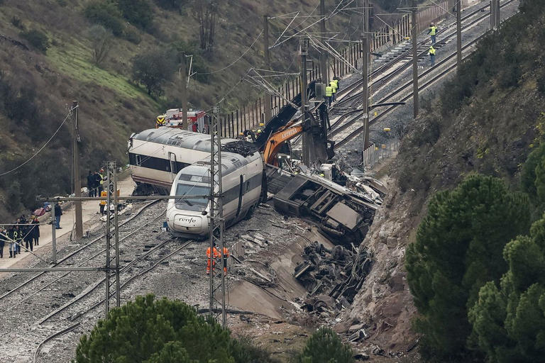 Man, 27, dies after train crashes into retaining wall in Spain days ...