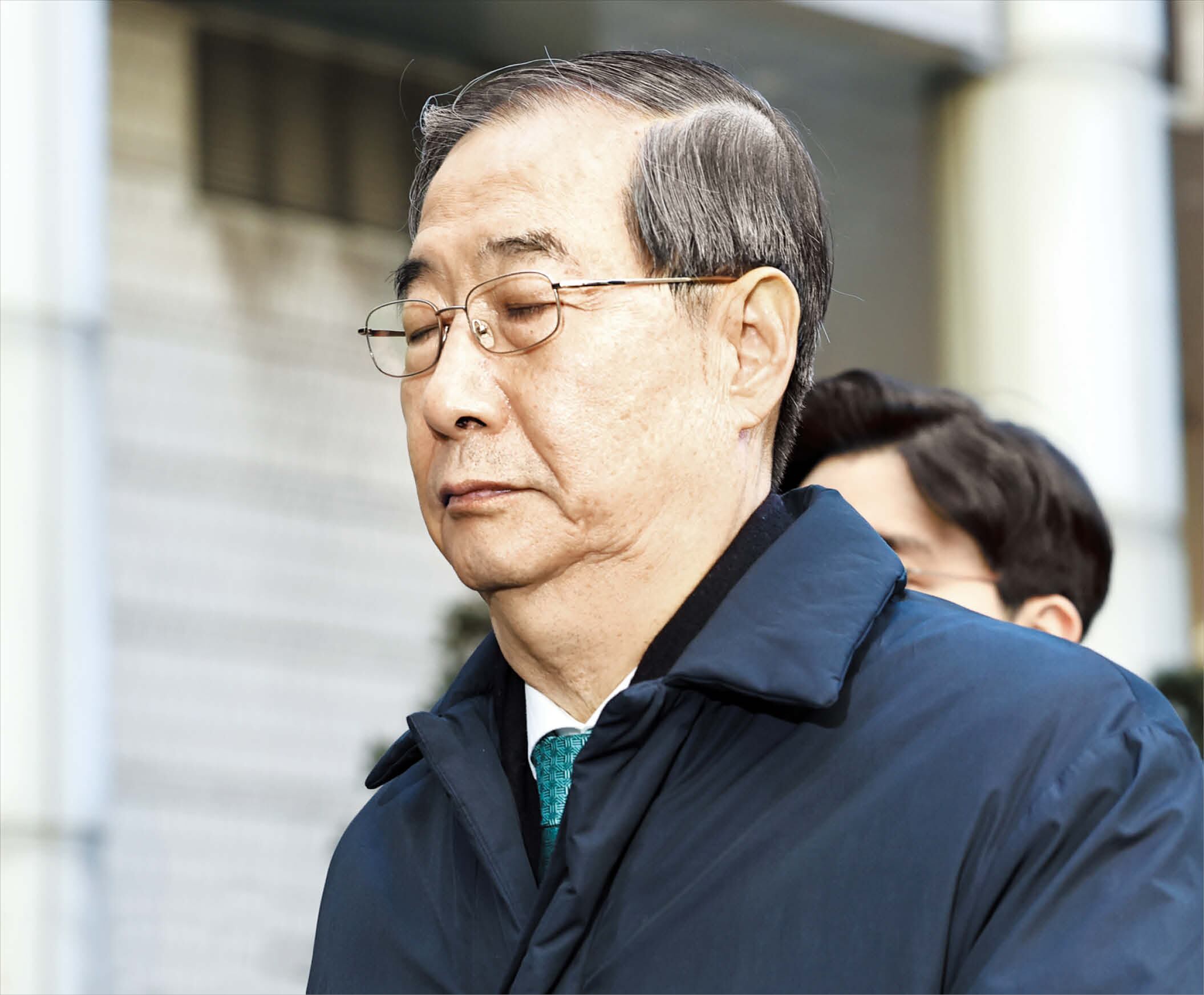 Former prime minister Han sentenced to 23 years for insurrection