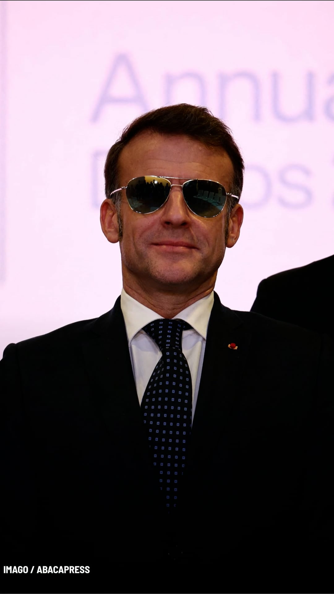 Why was Macron wearing sunglasses indoors at DAVOS?