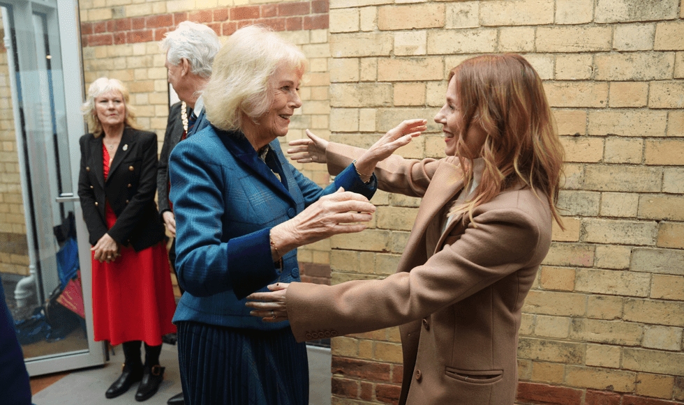 Queen shares warm moment with Spice Girl Geri Halliwell during ...