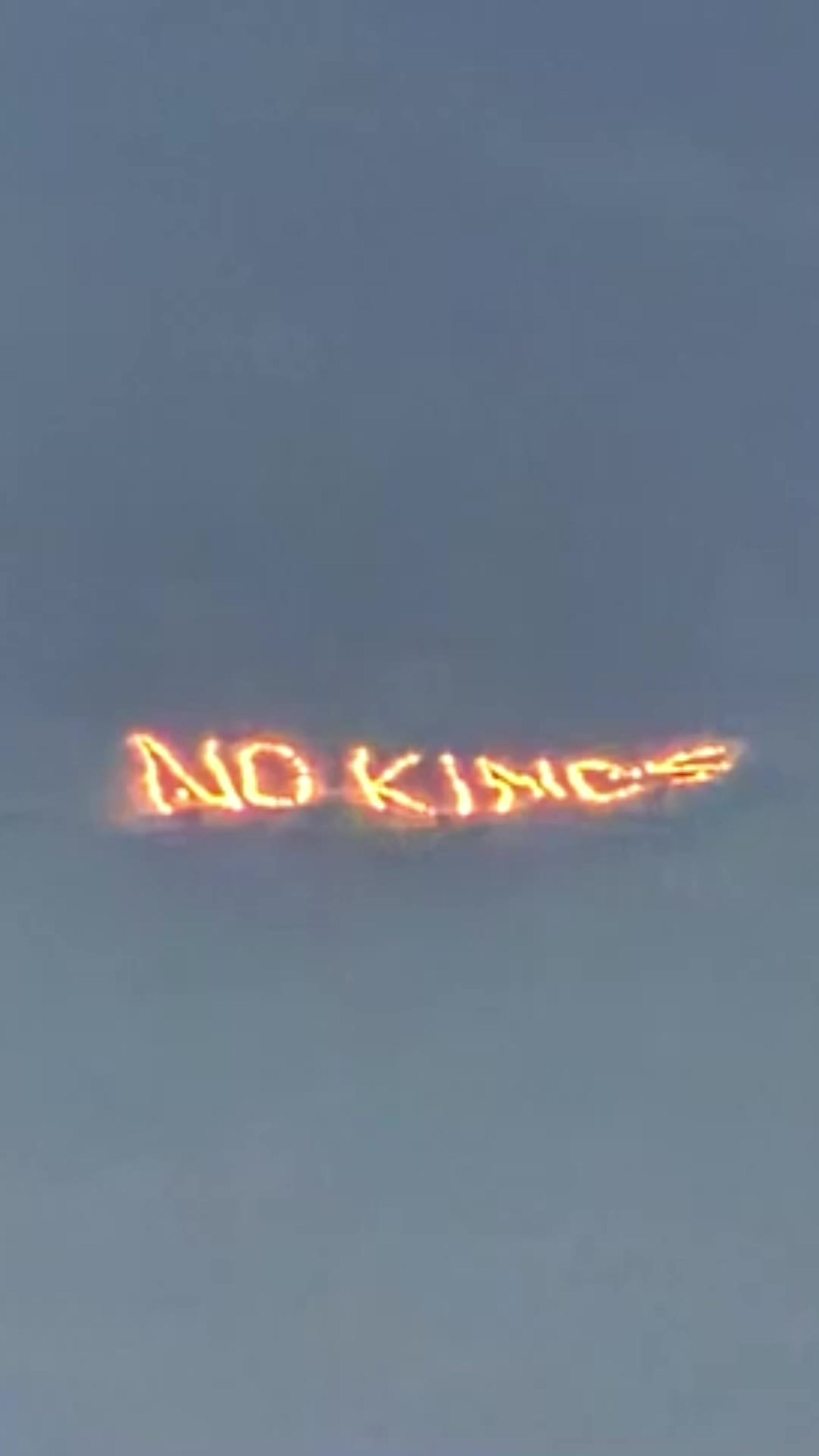 Lit-up sign reading 'No Kings' put up over Davos ahead of Trump visit