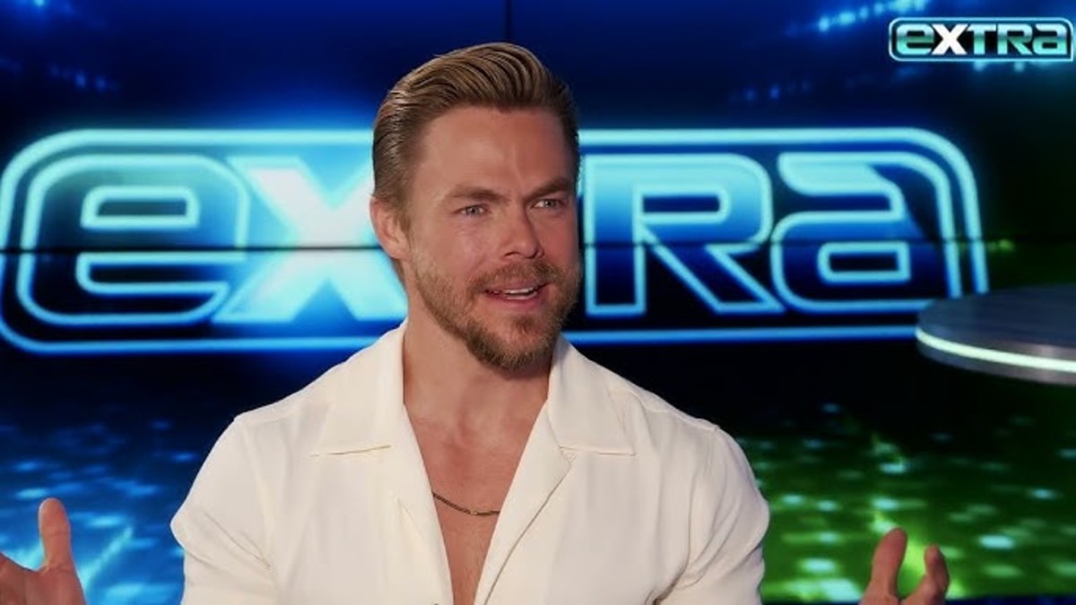 New father Derek Hough explains why hosting Extra is his "dad job"