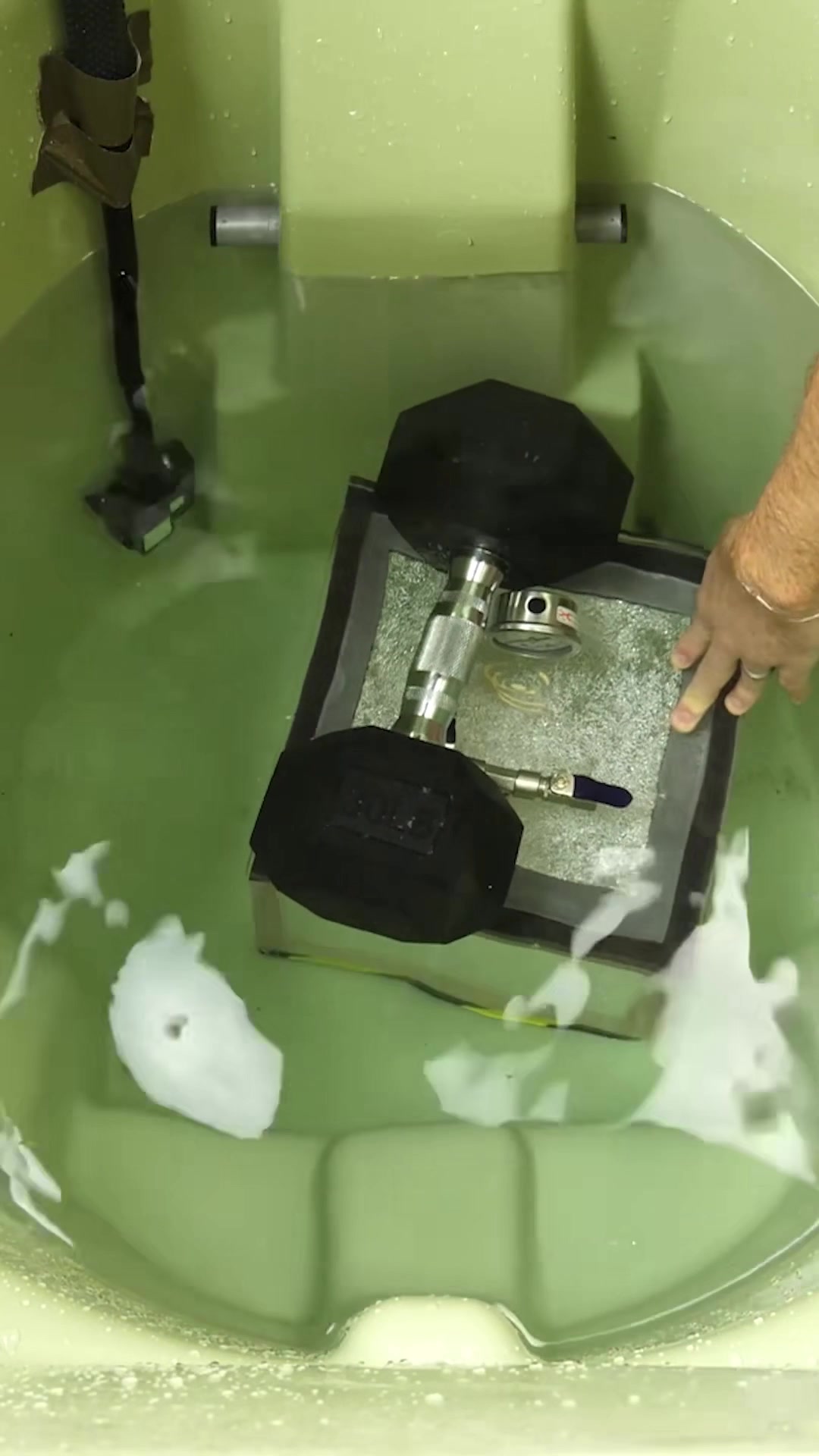 Openeing a vacuum chamber under water!