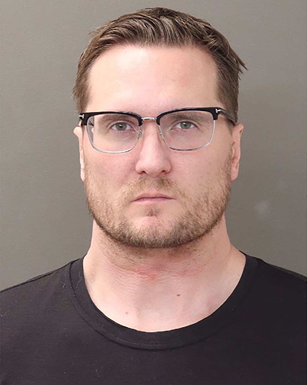 Illinois surgeon accused of killing ex-wife, her dentist husband wears ...