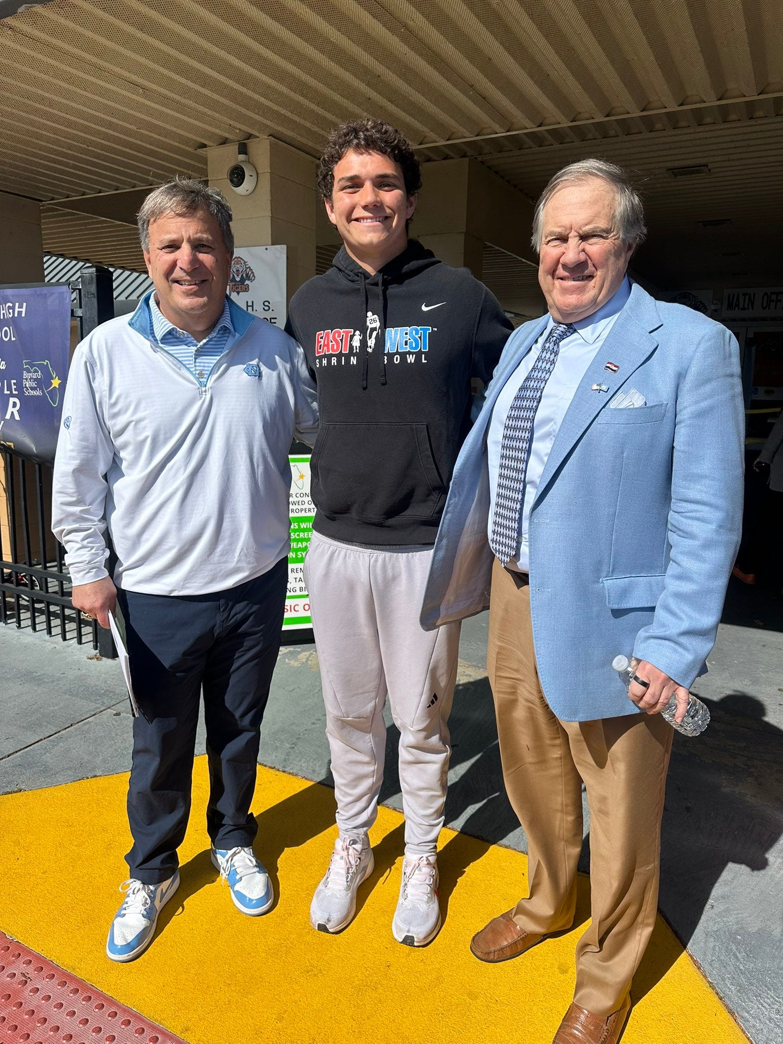Bill Belichick visits Cocoa High while recruiting QB Champ Smith