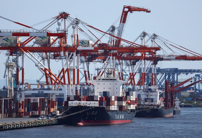 Japan's exports up for fourth straight month, US dip clouds outlook