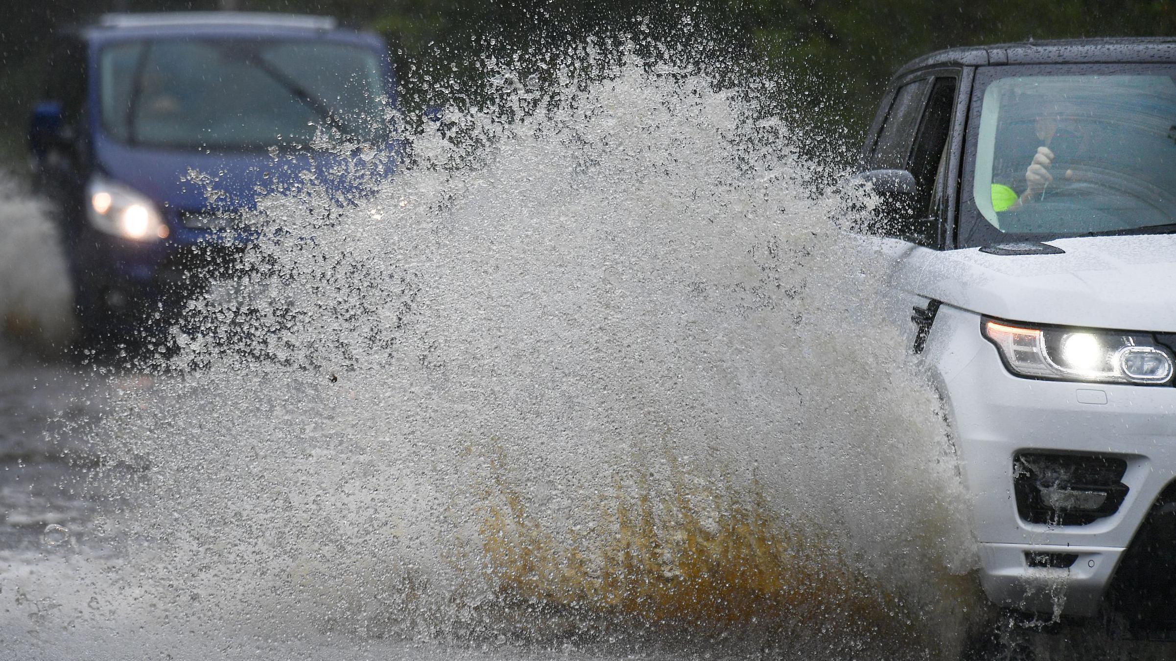 Police say high risk of travel disruption as amber rain warning issued