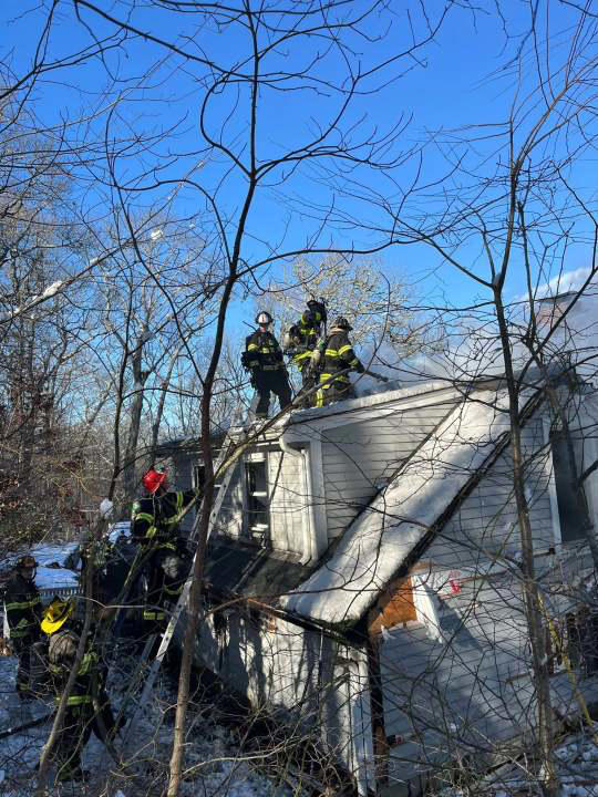 Garage, vehicle catch fire in Little Compton