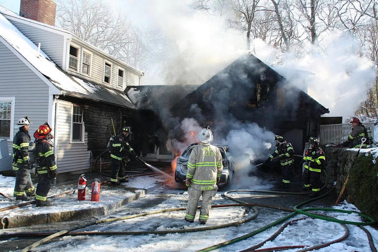 Garage, vehicle catch fire in Little Compton
