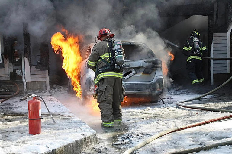 Garage, vehicle catch fire in Little Compton