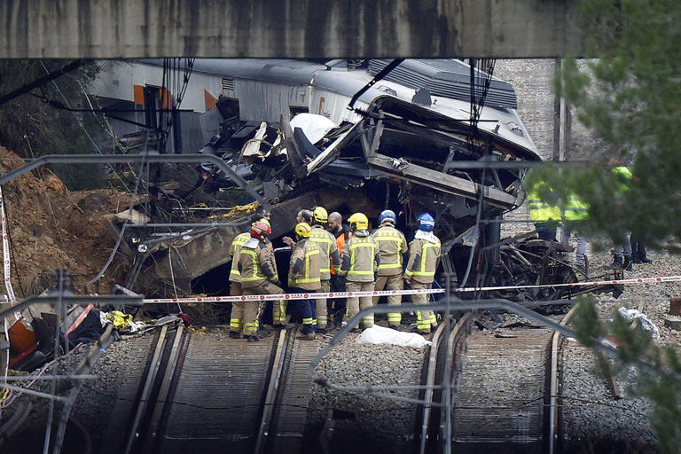 Man, 27, dies after train crashes into retaining wall in Spain days ...