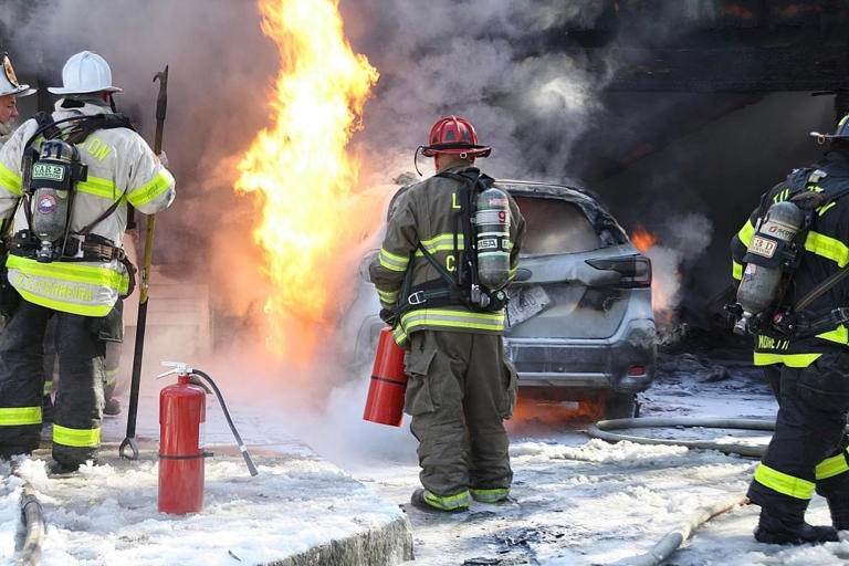 Garage, vehicle catch fire in Little Compton