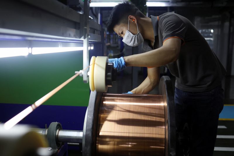Copper climbs with tight stocks, demand in focus