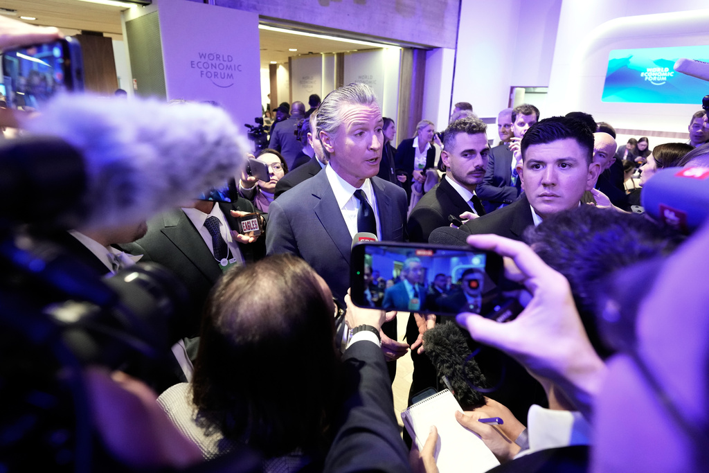 'Patrick Bateman meets Sparkle Beach Ken' turns Davos into the Gavin ...