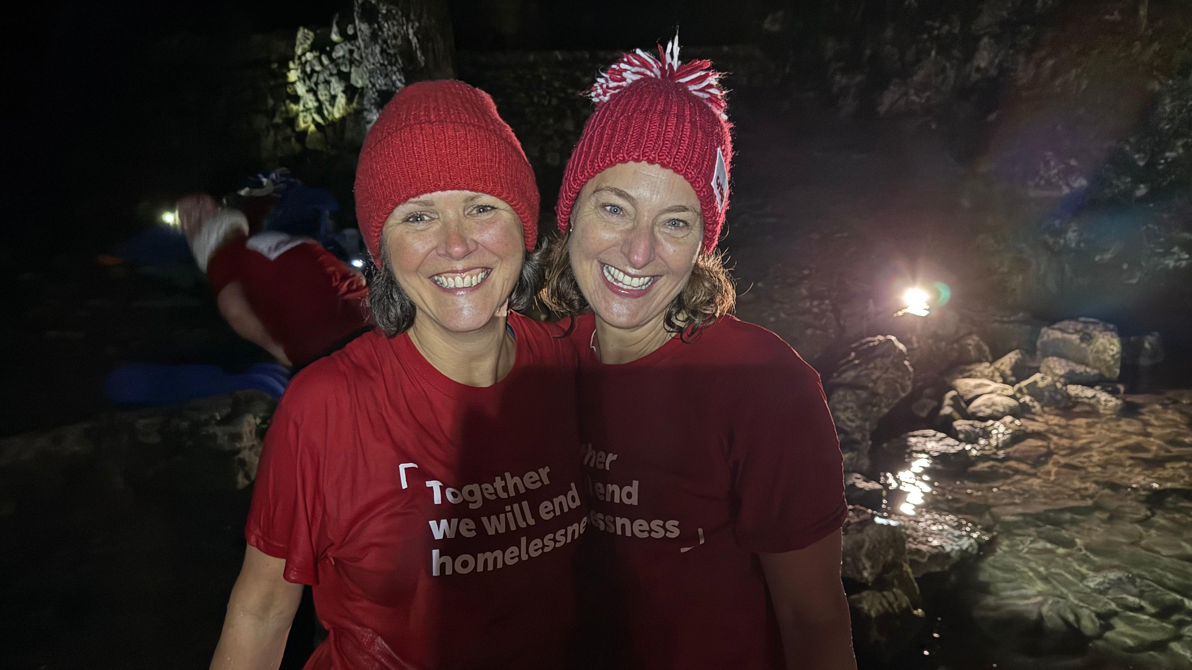 Night dip at waterfall raises money for homeless