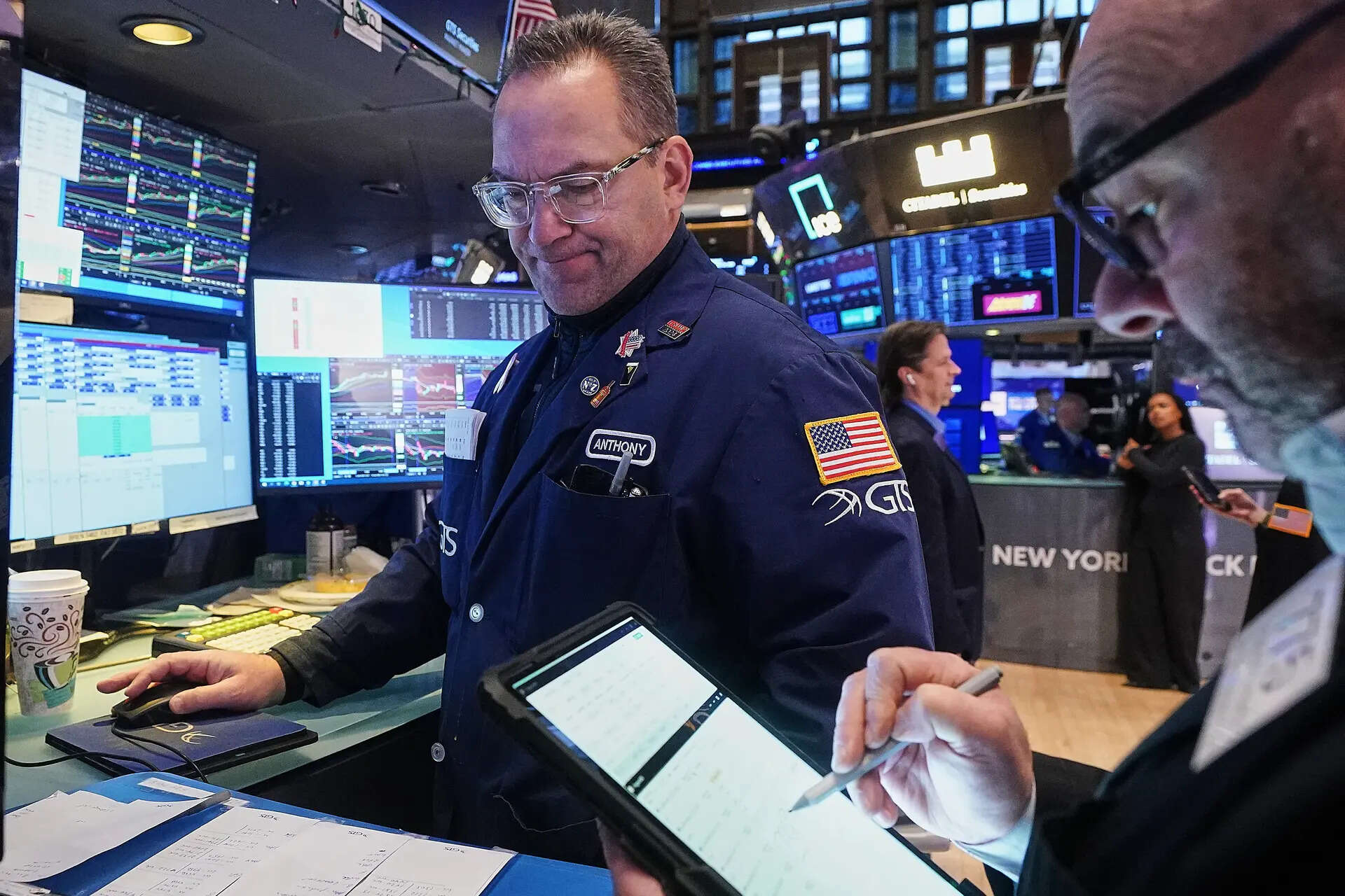 Wall Street ends higher as investors cheer Greenland framework deal ...