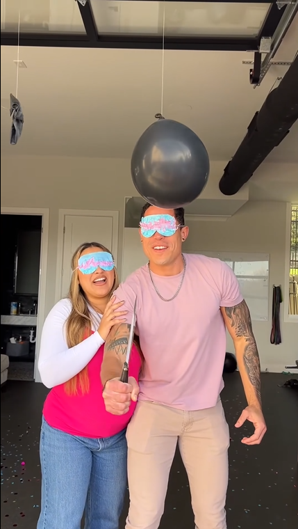 Watch the exploding balloons gender reveal surprise